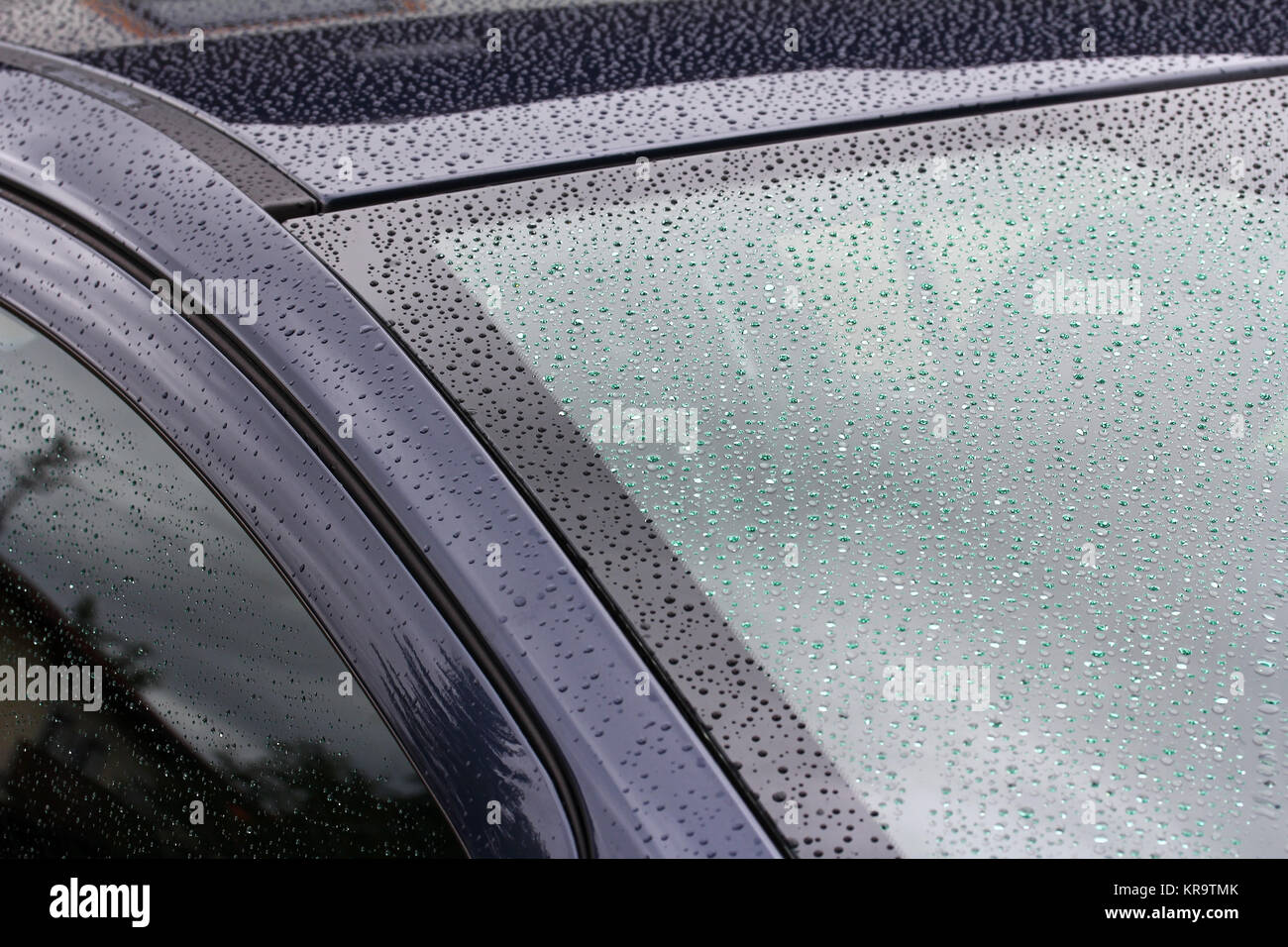 rainy weather and road - raindrops on a car Stock Photo - Alamy