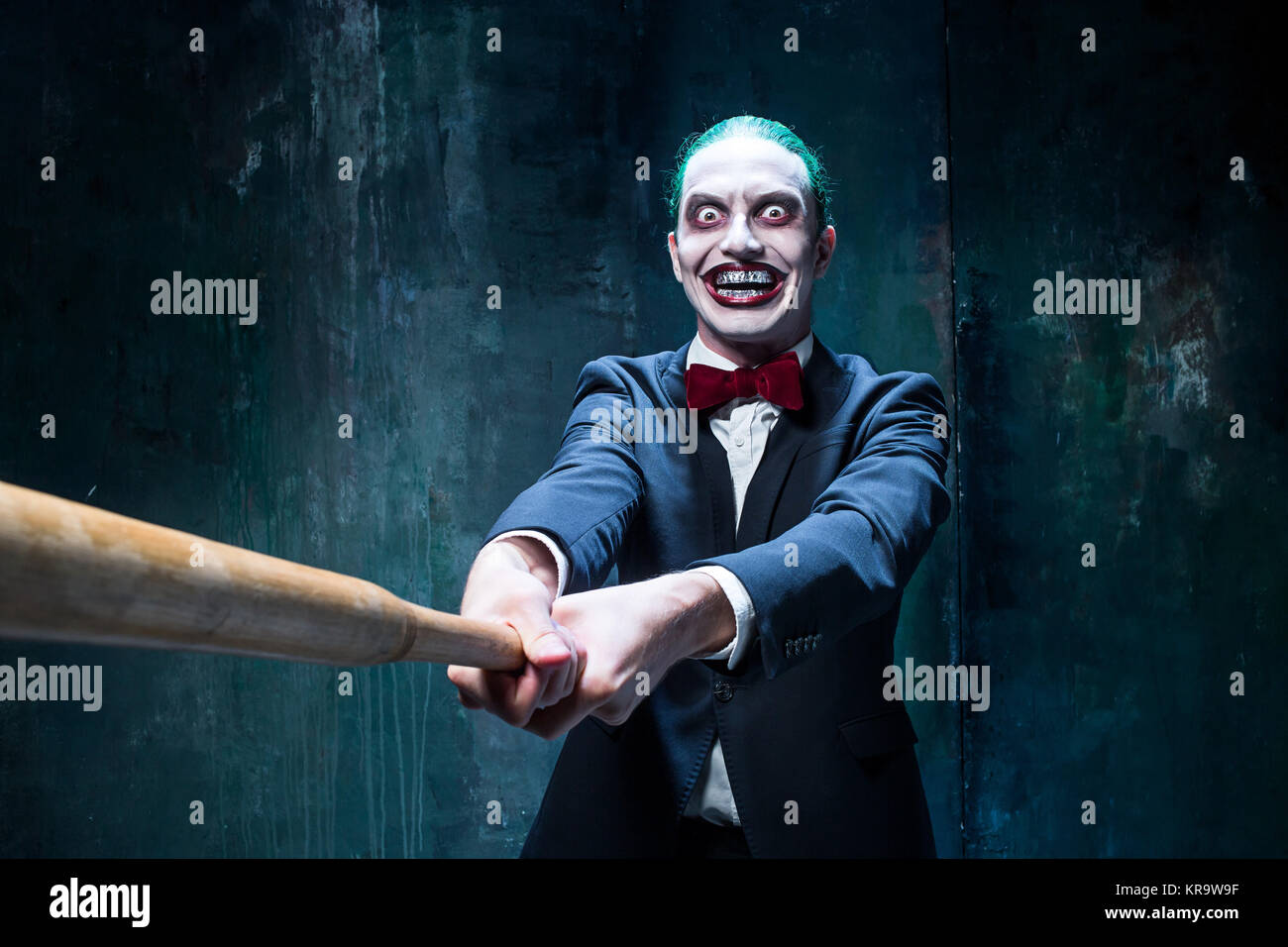 Bloody Halloween theme: crazy joker face Stock Photo - Alamy
