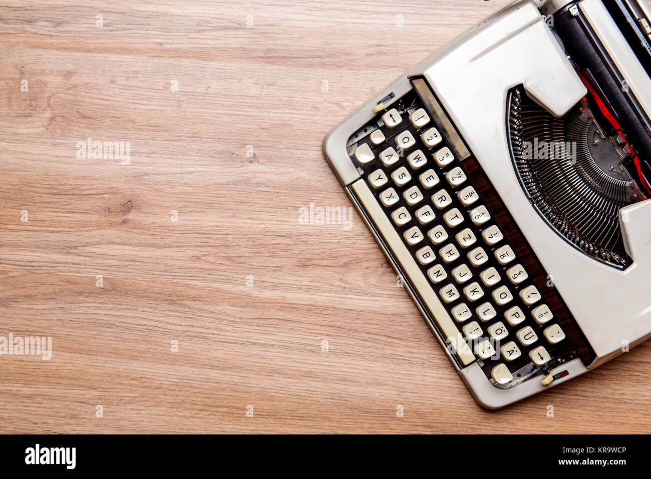 old typewriter on wooden ground from above Stock Photo - Alamy