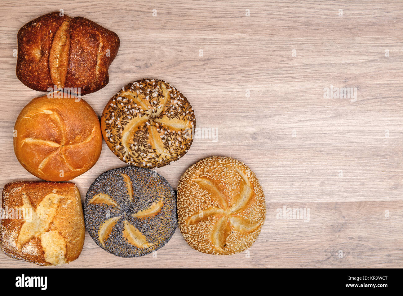 german baps on wooden ground from above Stock Photo - Alamy