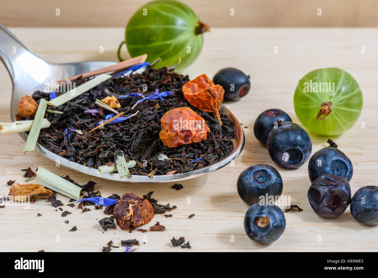 Black tea with different fruits and berries for breakfast Stock Photo ...