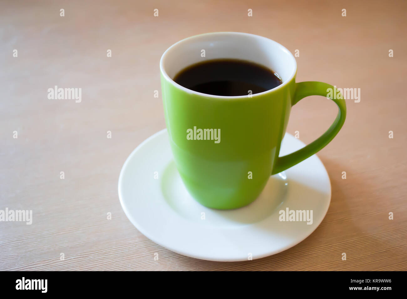 Green cup of coffee Stock Photo - Alamy