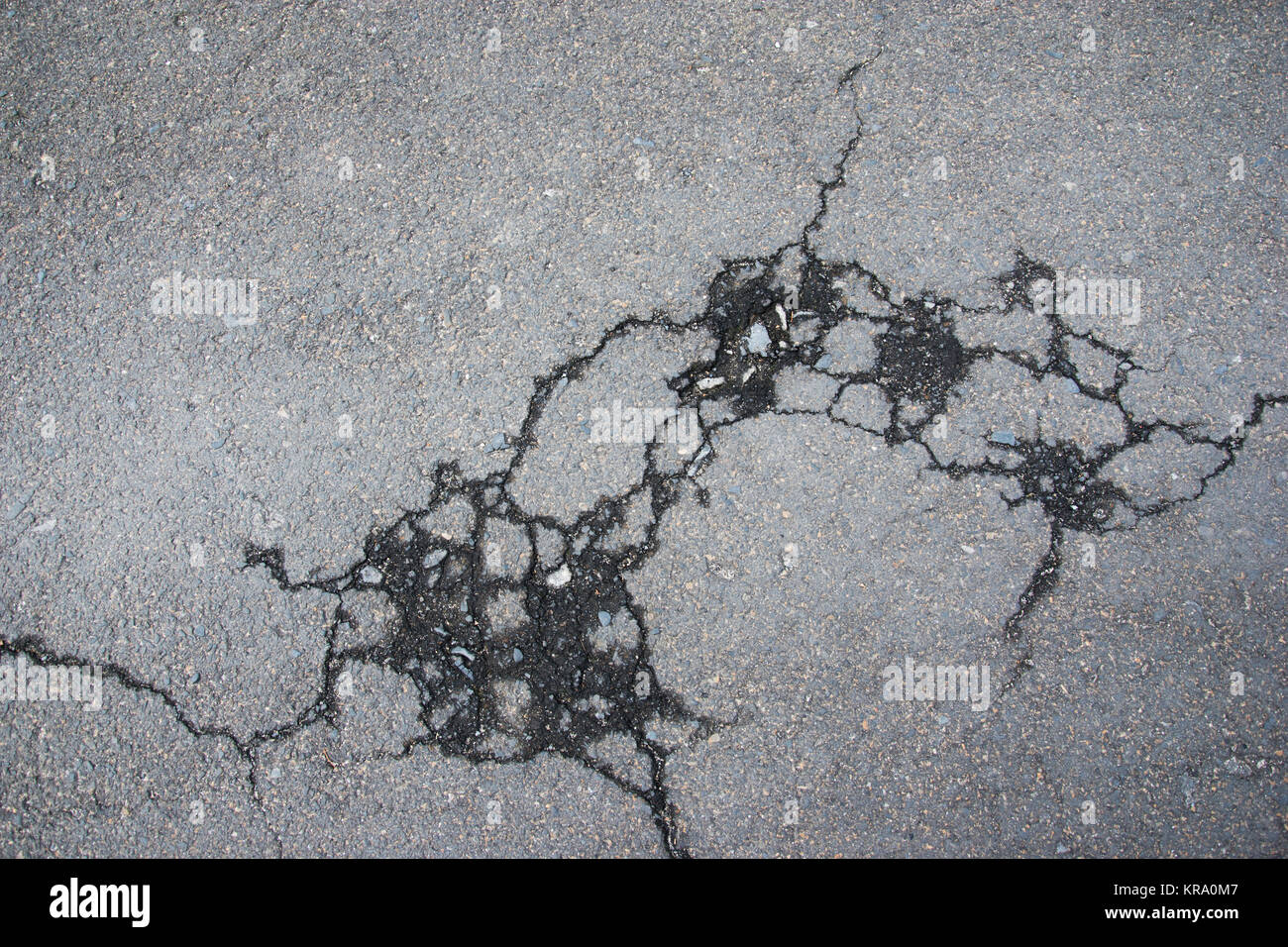Cracked road alphalt texture, broken ground structure photo Stock Photo ...