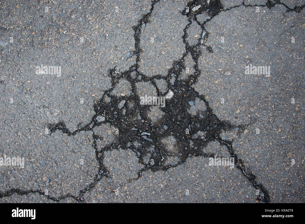 Closeup cracked asphalt texture hi-res stock photography and images - Alamy