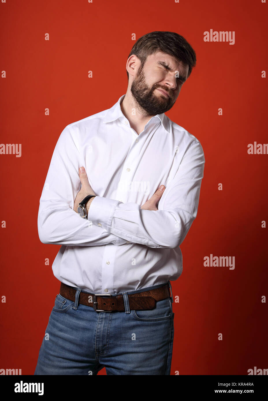 Disgusted bearded business man with closed eyes and unhappy face in ...