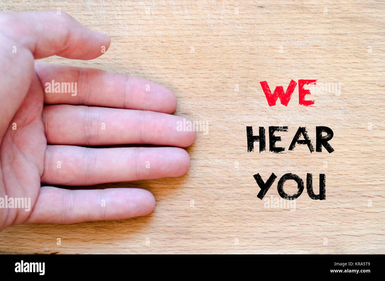 We hear you text concept Stock Photo - Alamy