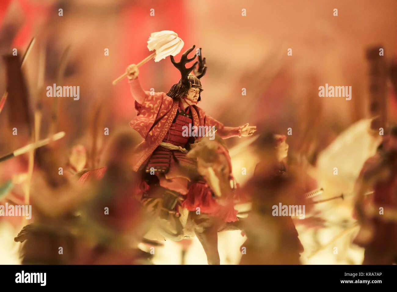 Miniature model of a Japanese samurai warrior riding a horse on ...