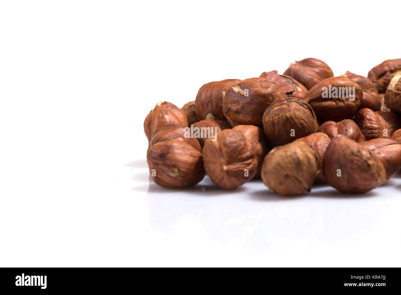 Heap of hazelnuts Stock Photo - Alamy
