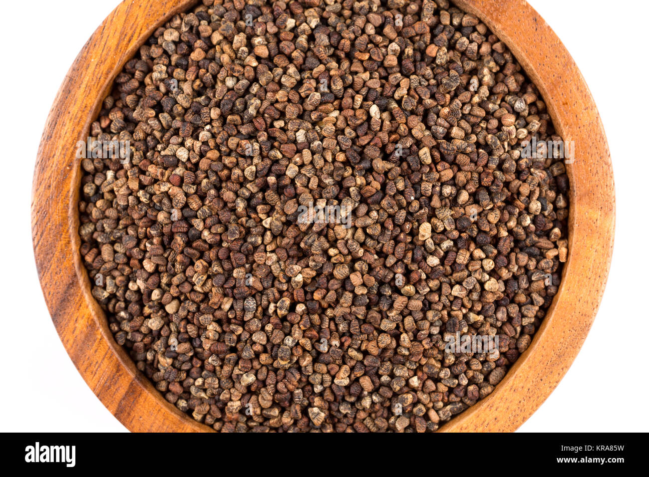 Decorticated cardamom seeds in a bowl Stock Photo - Alamy