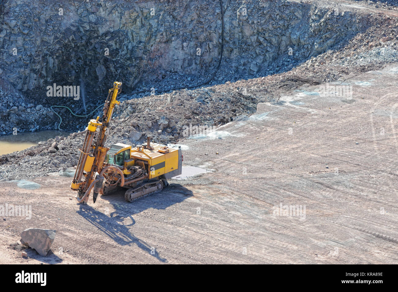 driller in a quarry mine. exploring rock material. porphyry rocks Stock ...