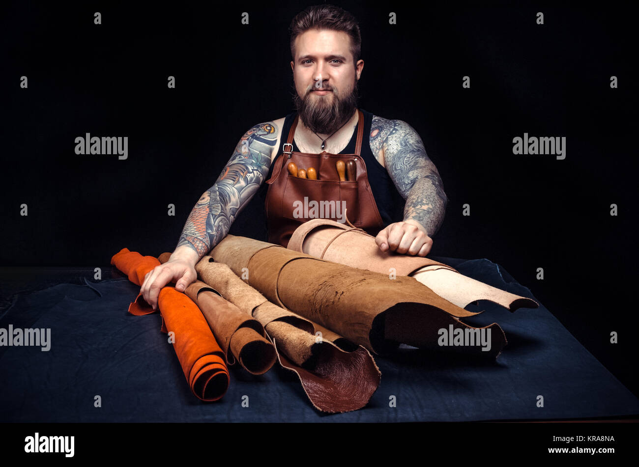 Handyman manufacturing new leather product./Professional Leather Worker ...