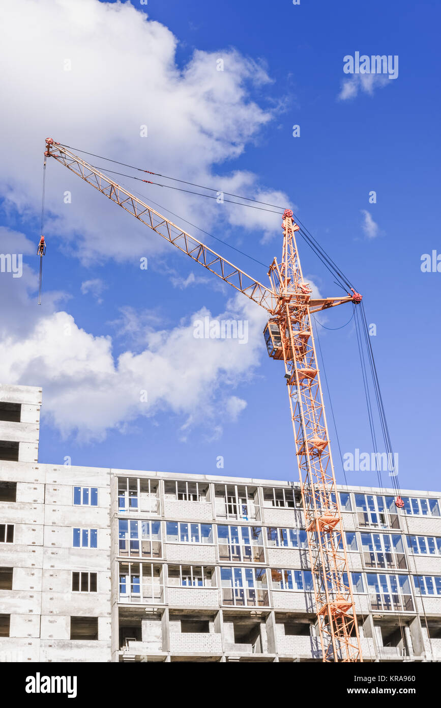 Crane is used in the construction of buildings Stock Photo - Alamy