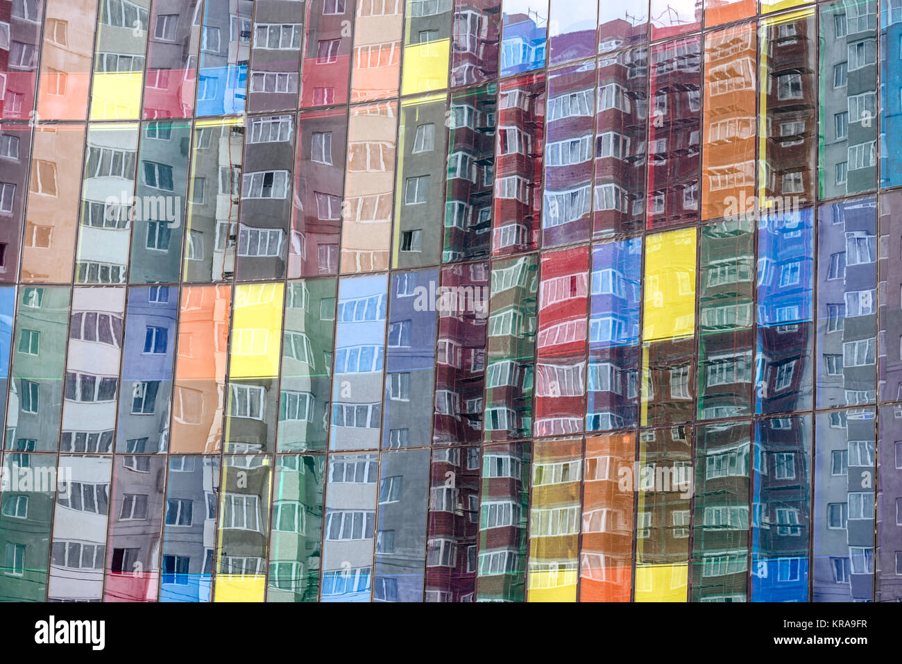 Colorful windows building for background Stock Photo - Alamy
