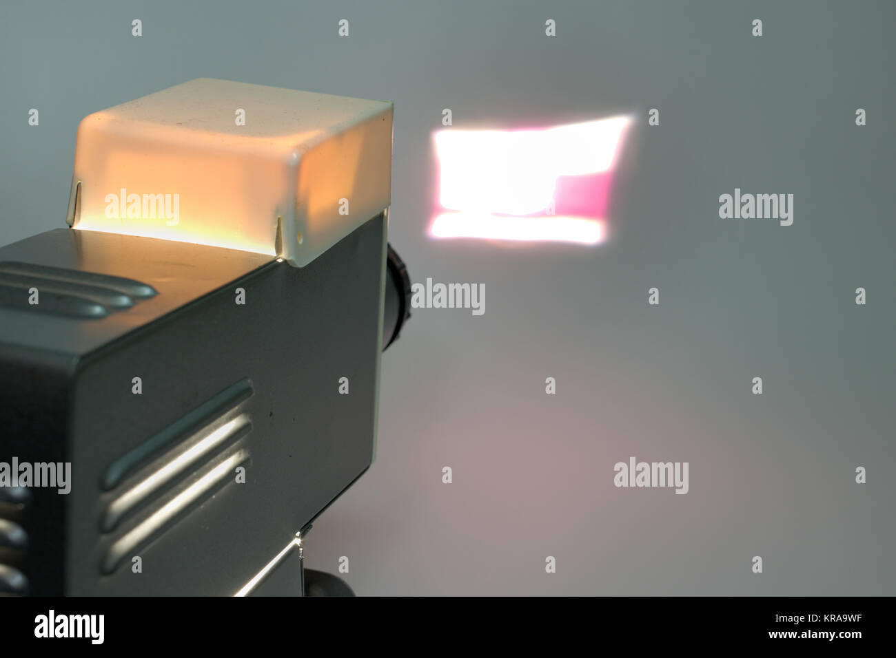 Vintage slide projector in work. Back view Stock Photo - Alamy