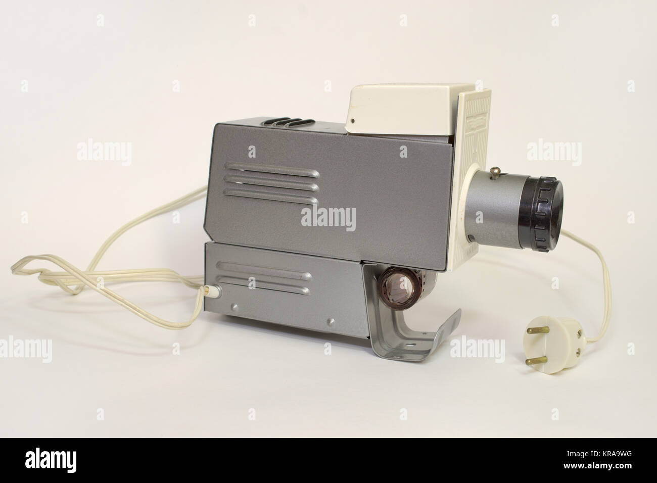 Vintage slide projector loaded with film. Side view Stock Photo - Alamy