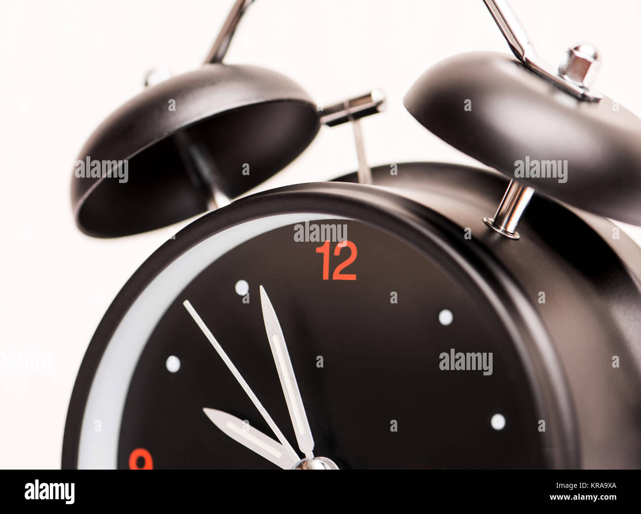 black alarm clock Stock Photo - Alamy