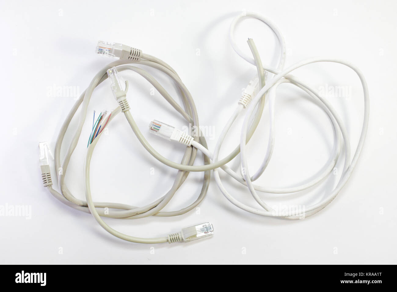 set of patch cords with different color top wire insulation, coiled ...