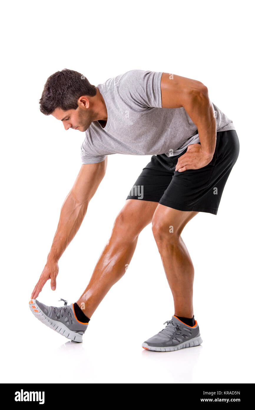 Young sportsman doing exercises Cut Out Stock Images & Pictures - Alamy