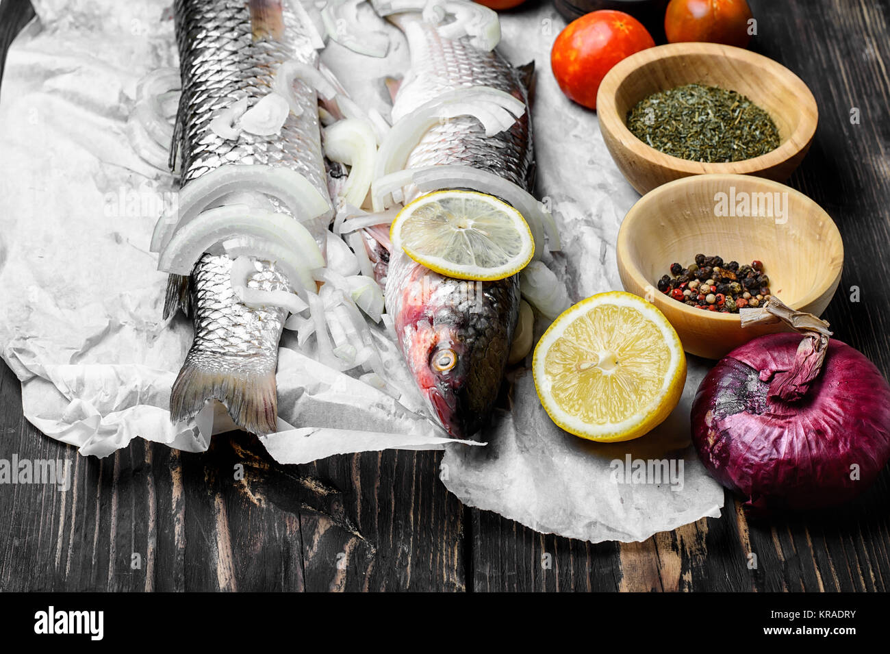 Two prepared for cooking fish with spices and seasonings Stock Photo ...