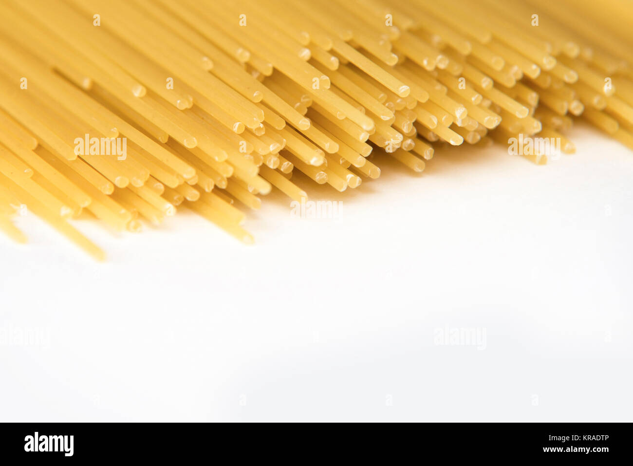 Bunch of spaghetti on white background Stock Photo - Alamy
