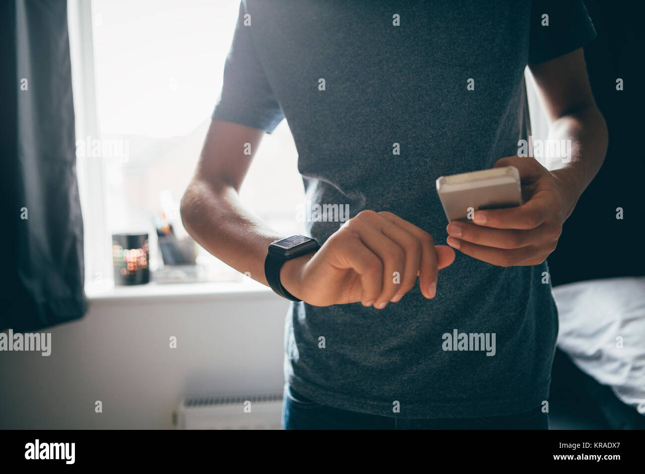 Smartwatch and Smartphone Stock Photo - Alamy