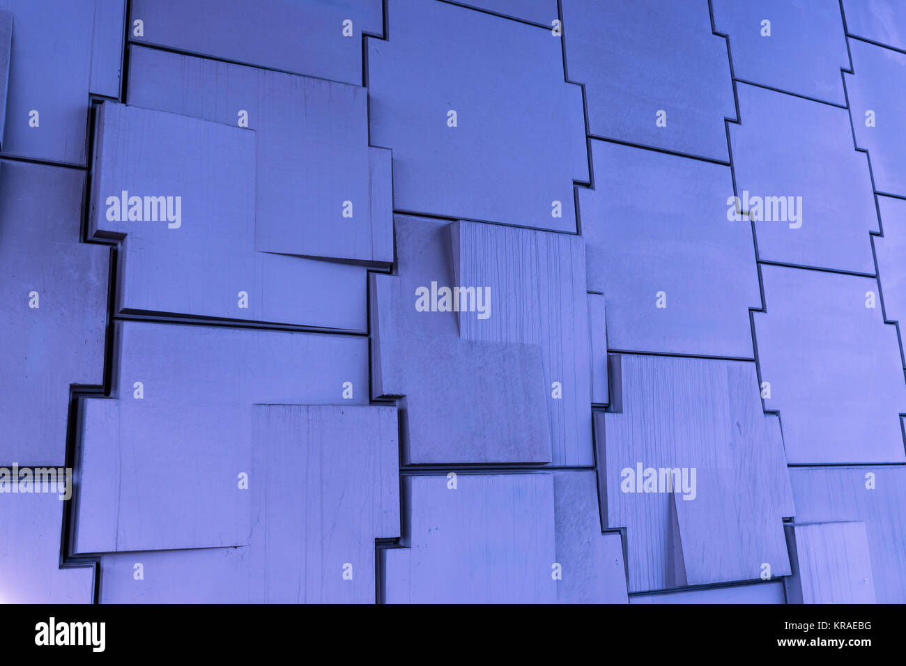 Geometric concrete block blue tint Stock Photo - Alamy