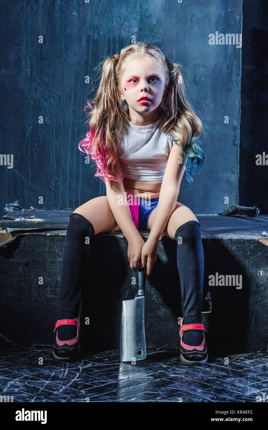 Young gothic woman a knife hi-res stock photography and images - Alamy