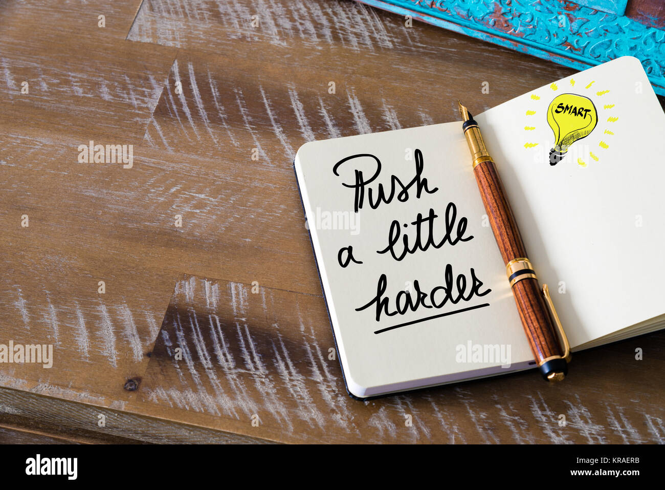 Written text PUSH A LITTLE HARDER Stock Photo - Alamy