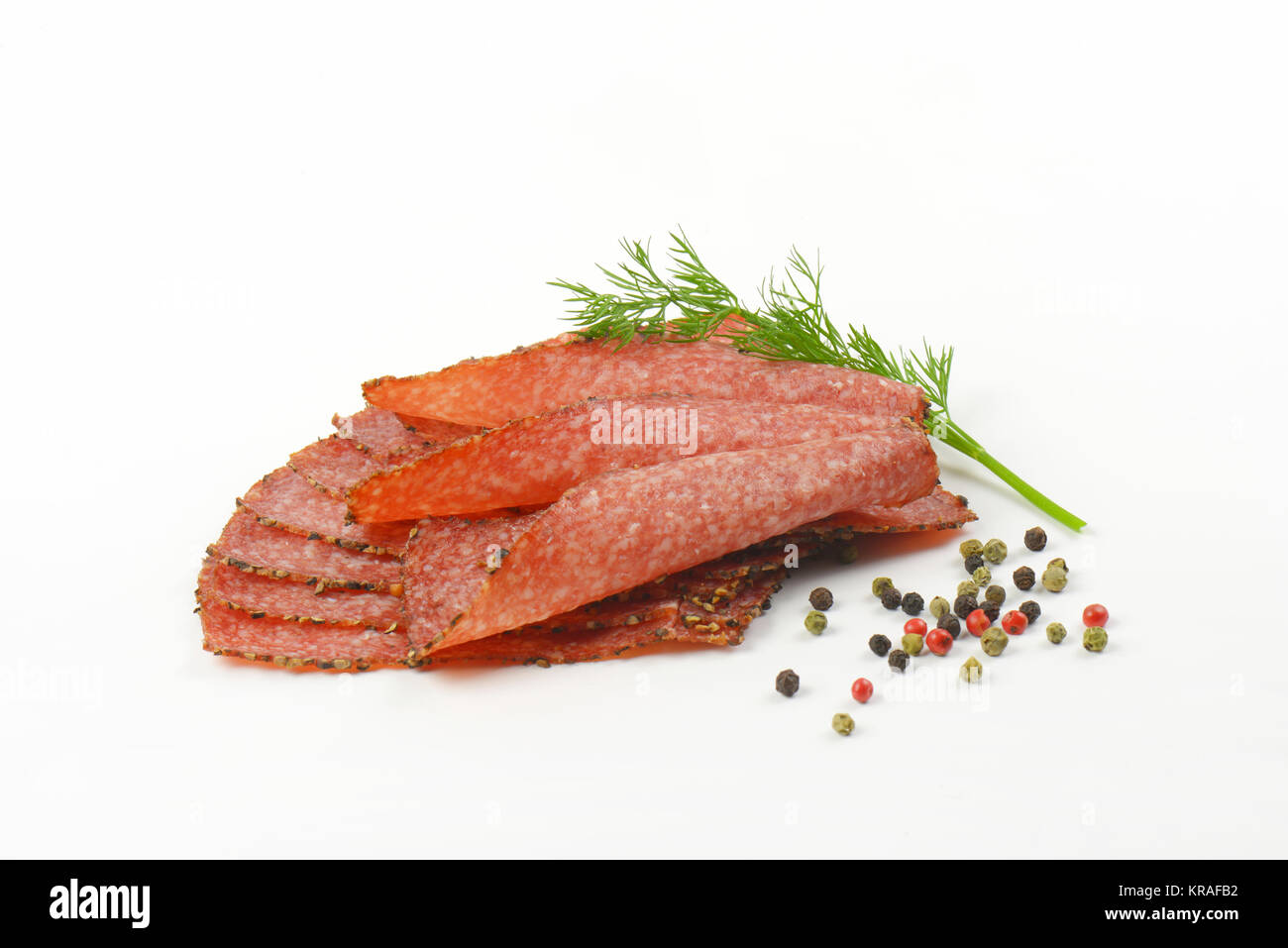 Thin sliced pepper coated salami Stock Photo - Alamy