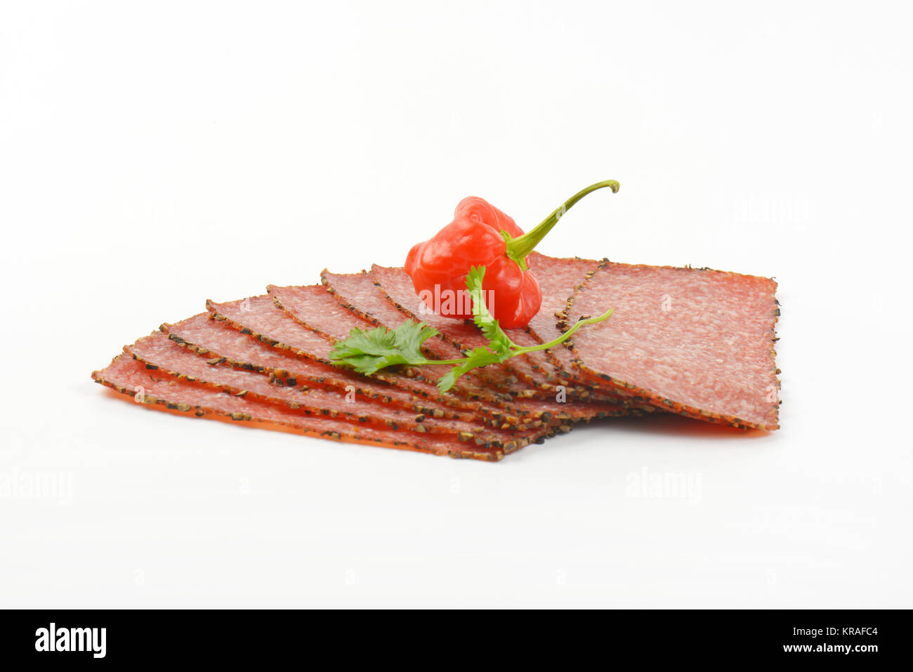 Black pepper salami slices Stock Photo - Alamy