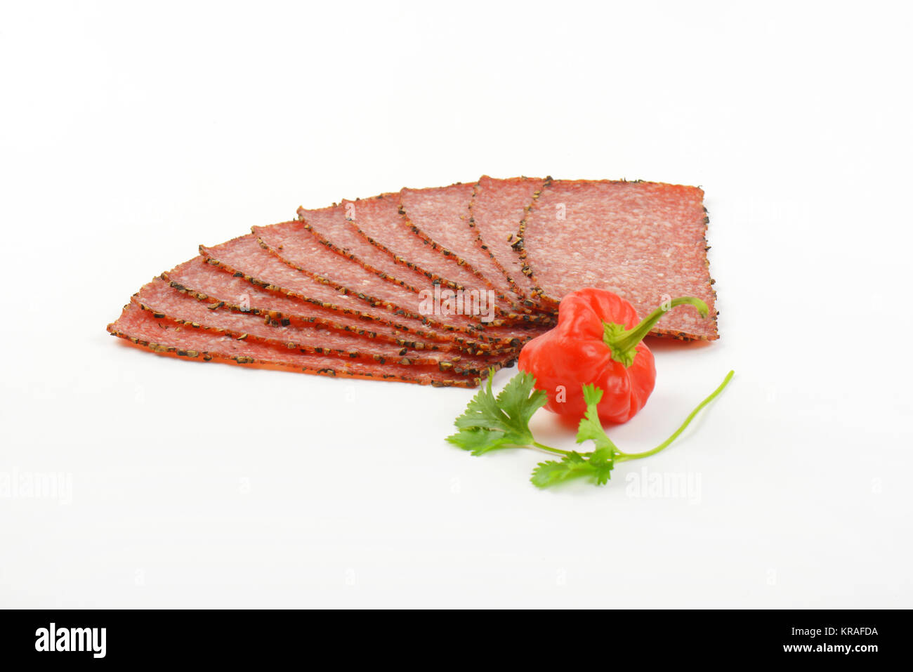 Black pepper salami slices Stock Photo - Alamy