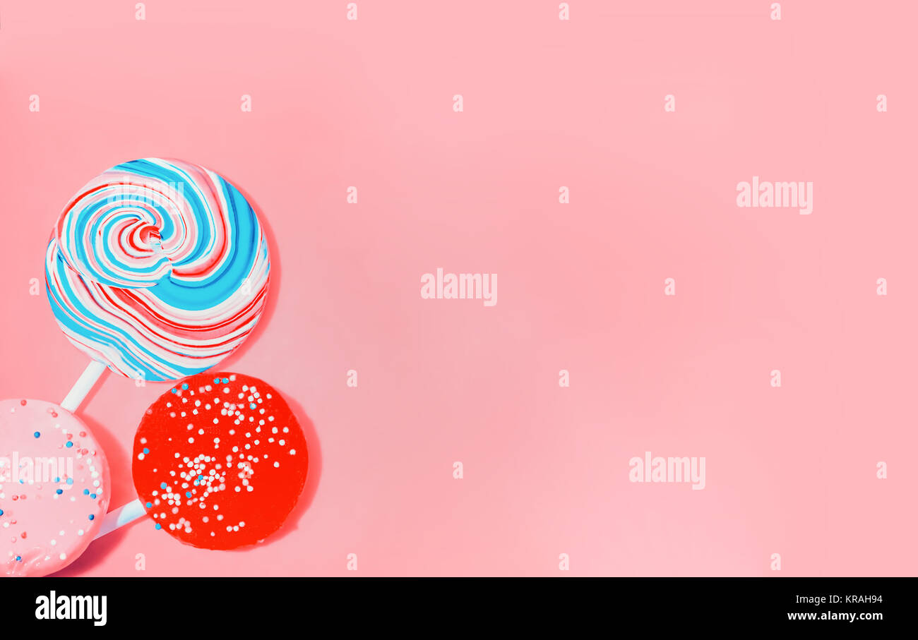 Vintage Pink Background With Colored Candy Stock Photo - Alamy