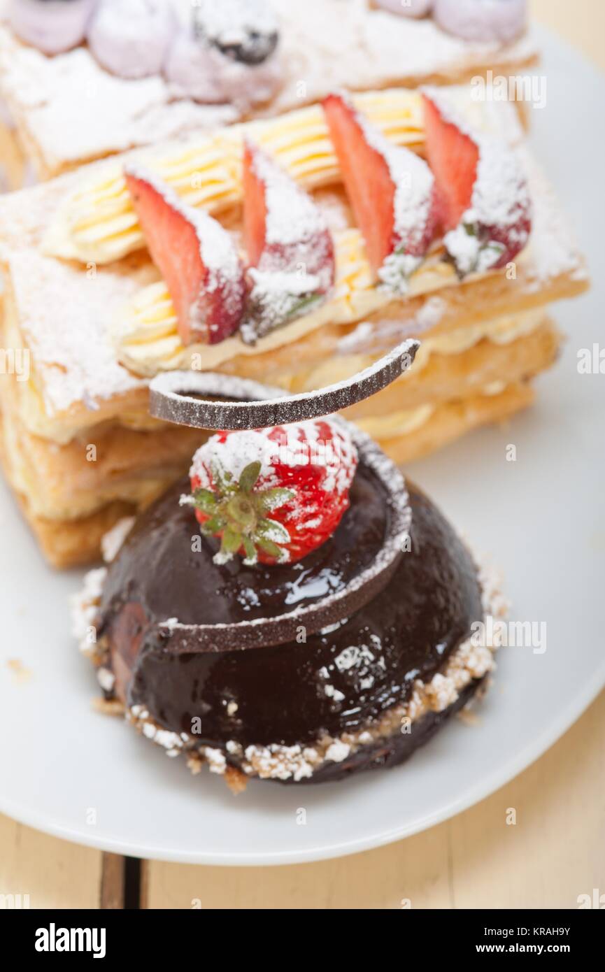 selection of fresh cream cake dessert plate Stock Photo - Alamy