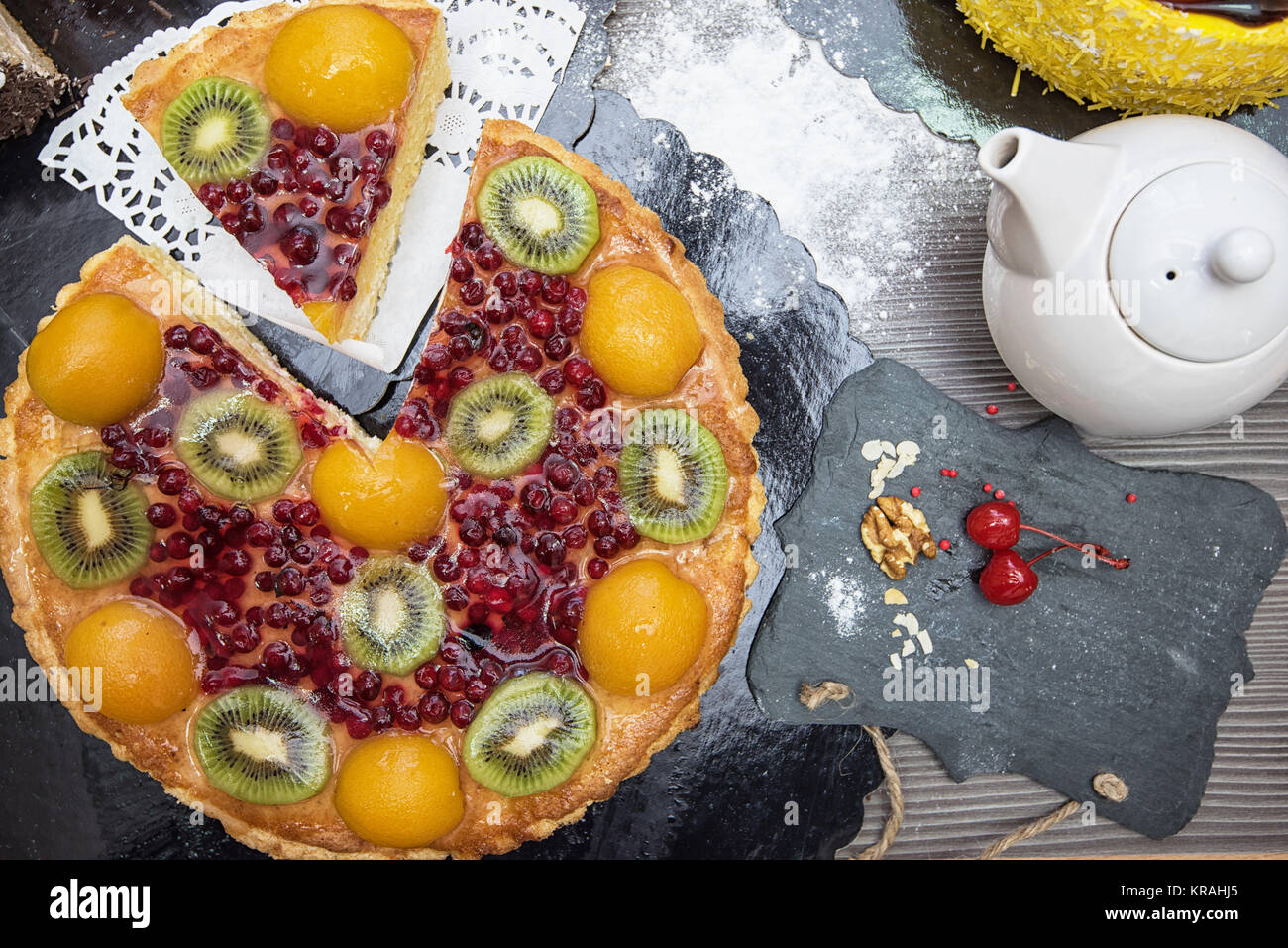 Table with fruit cakes Stock Photo - Alamy