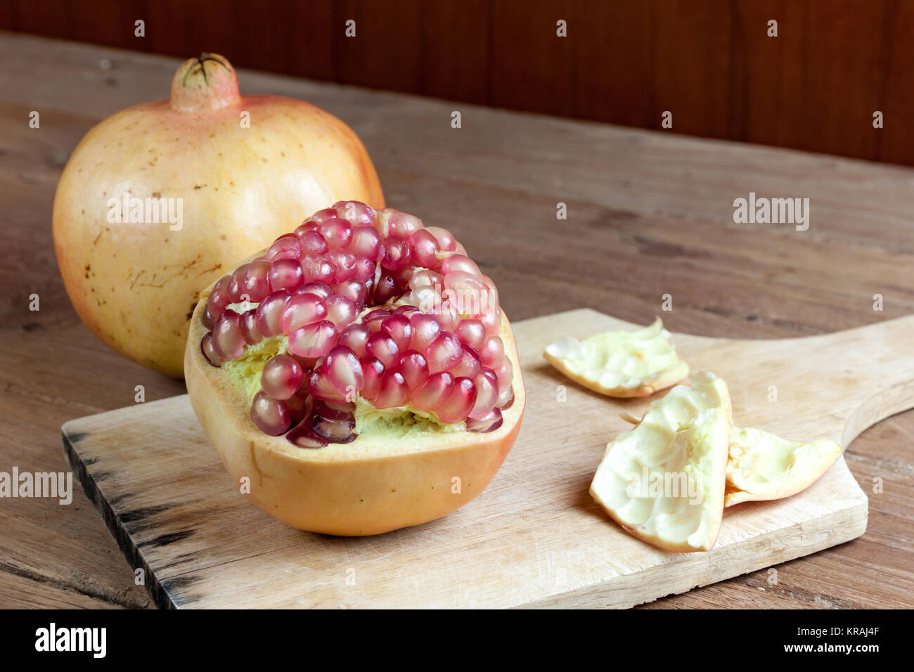 Pomegranate fruit cut dissect Stock Photo - Alamy