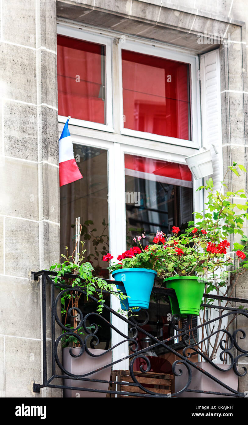 paris- french window with flowers and flag Stock Photo - Alamy