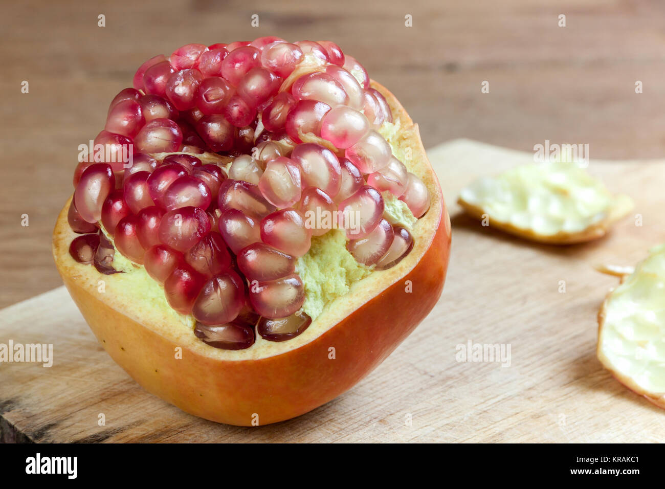 Pomegranate fruit cut dissect Stock Photo - Alamy