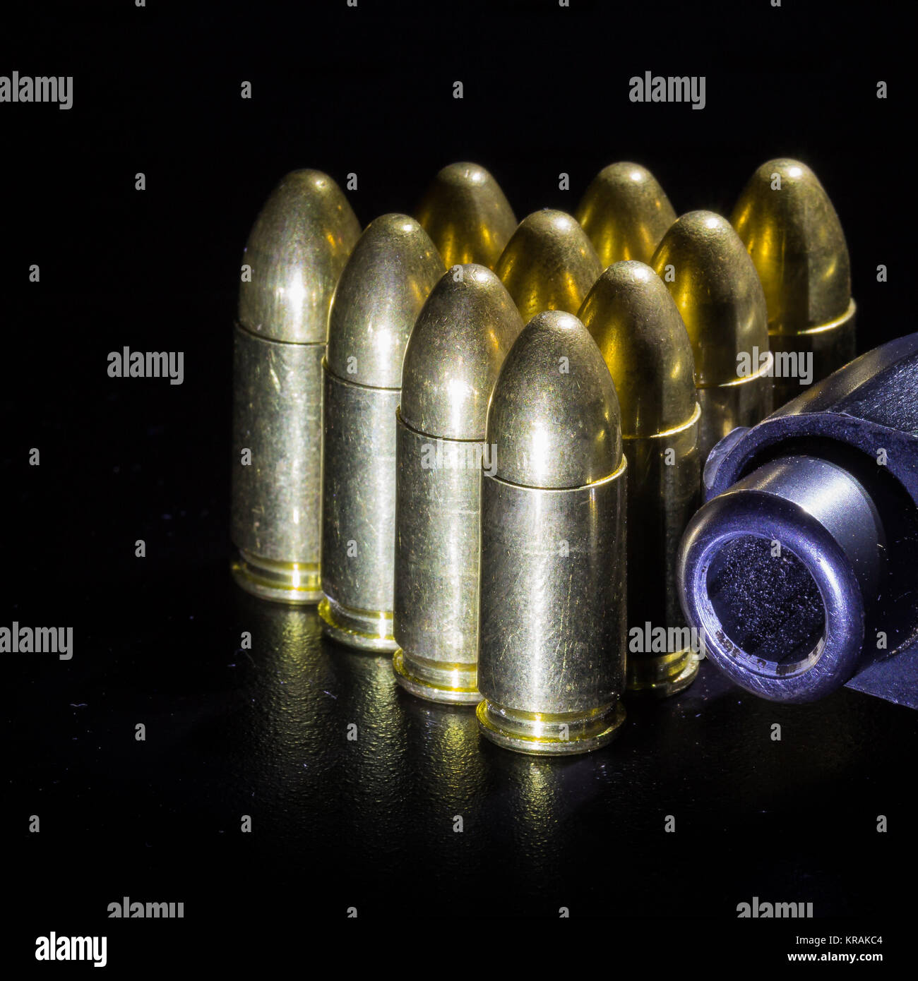 Gun and bullets Stock Photo - Alamy