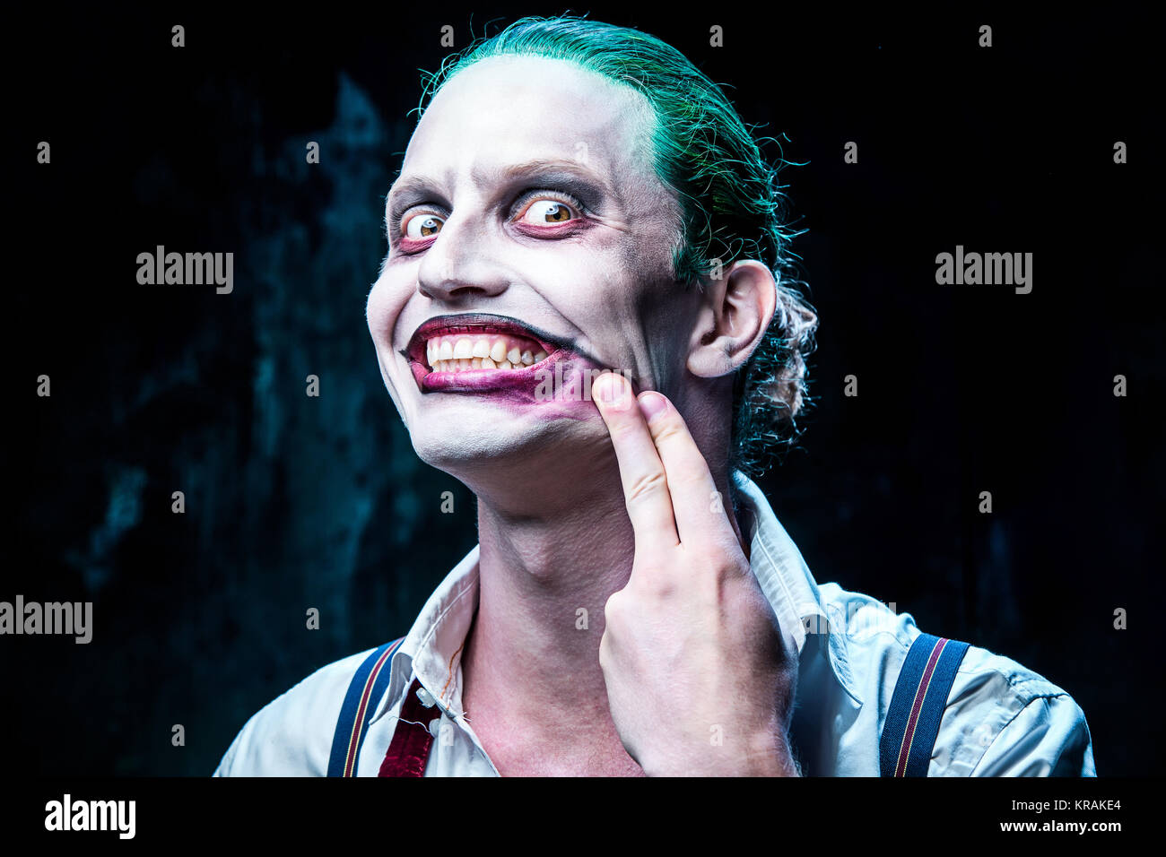 Bloody Halloween theme: crazy joker face Stock Photo - Alamy