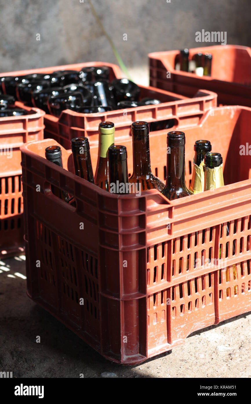 Red wine boxes with bottles inside. Home winemaking vinification ...