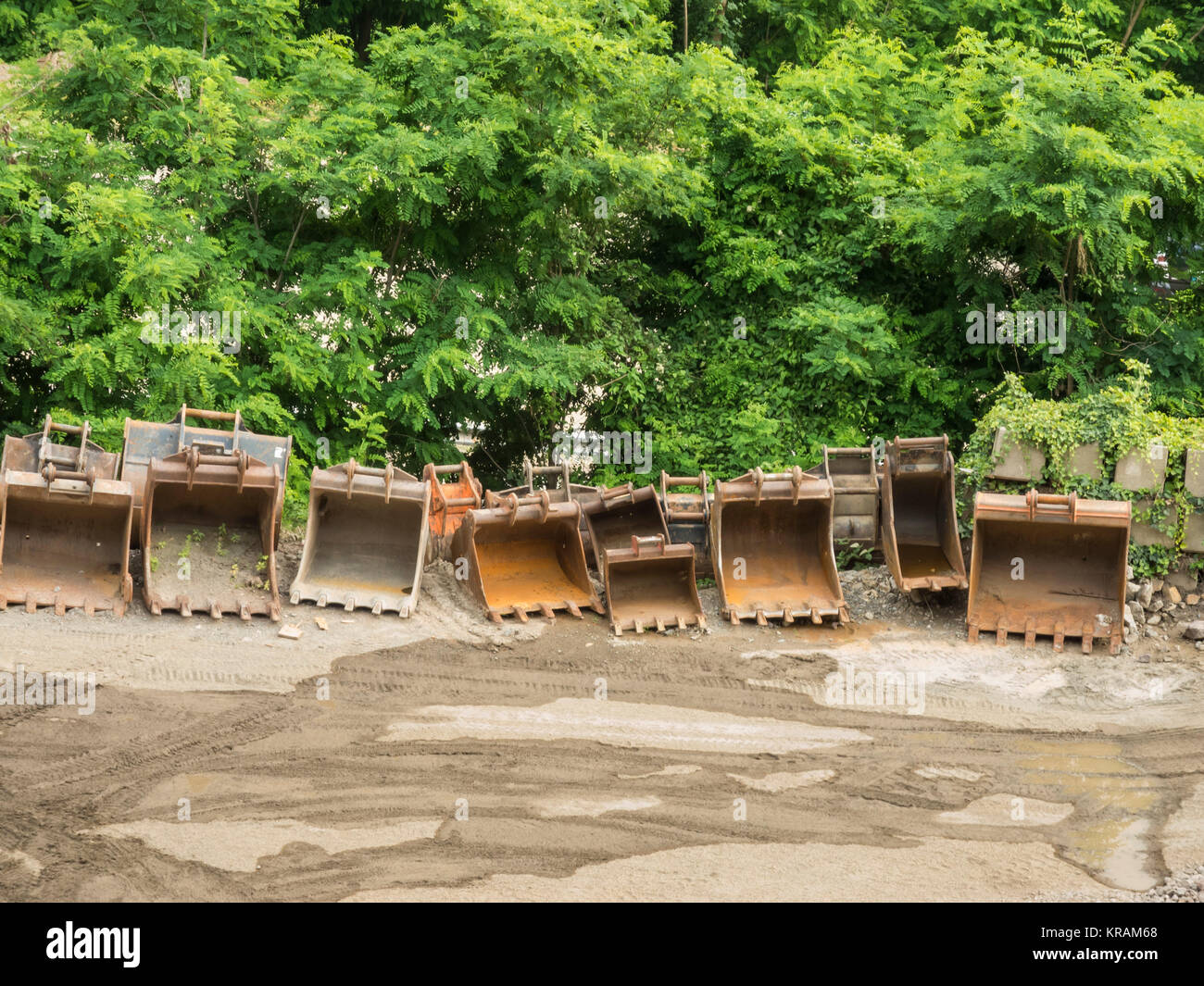 buckets in a row Stock Photo - Alamy