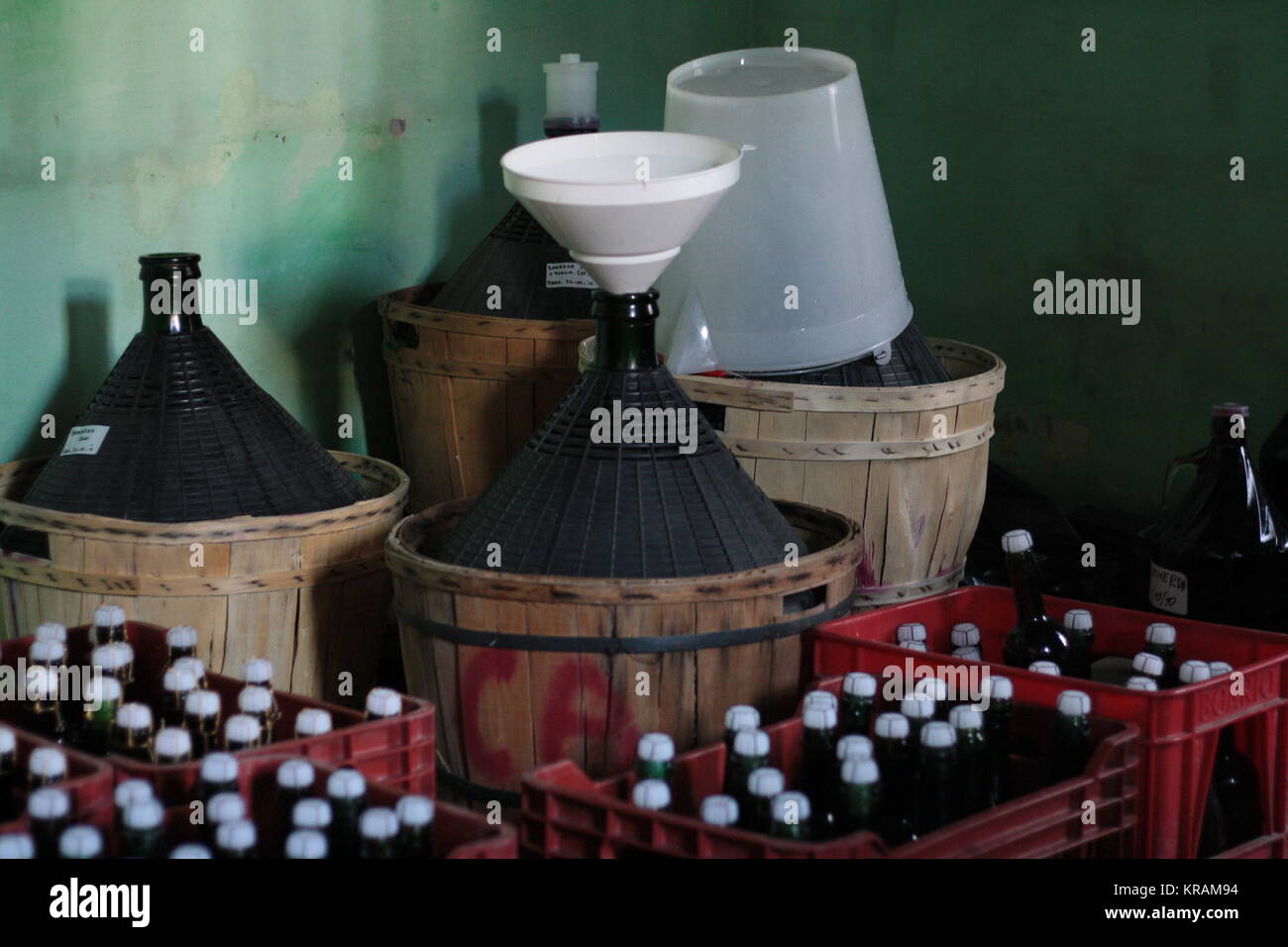 Demijohns Carboys and bottles in winery Stock Photo - Alamy