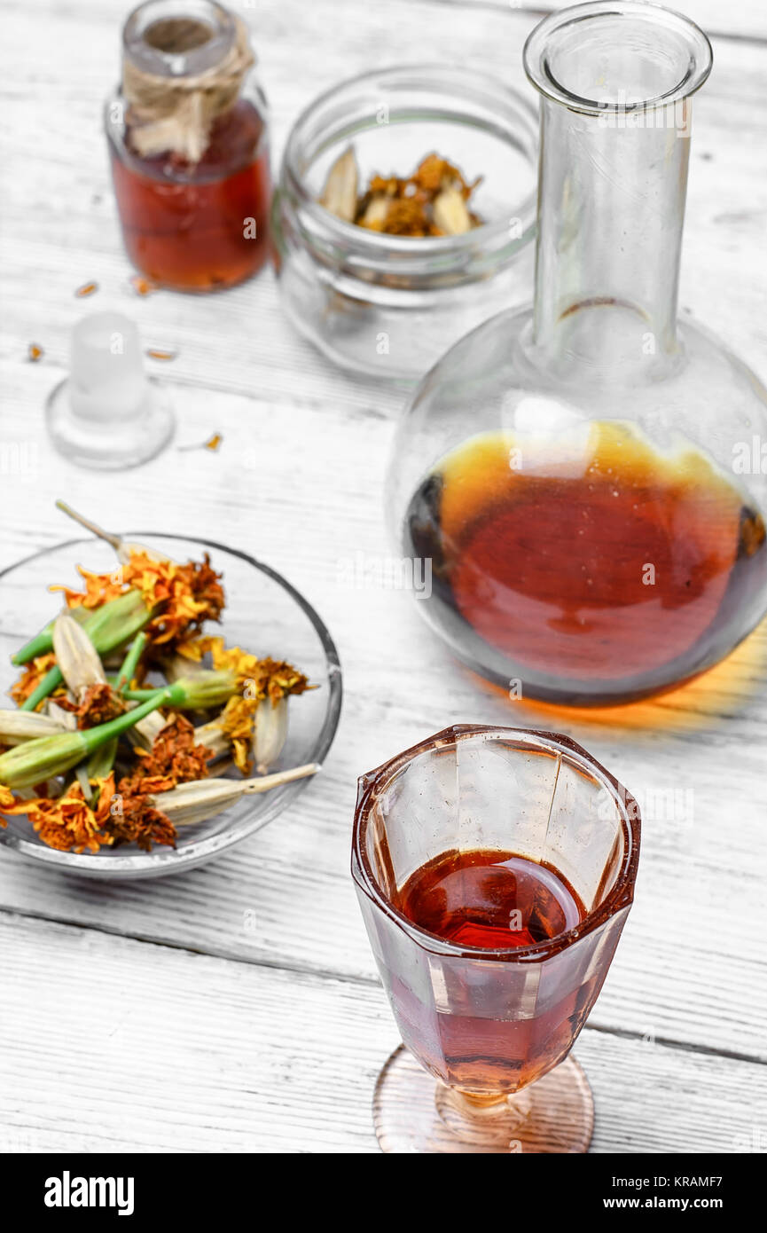 Medical extract decoction from the flowers of marigold Stock Photo - Alamy
