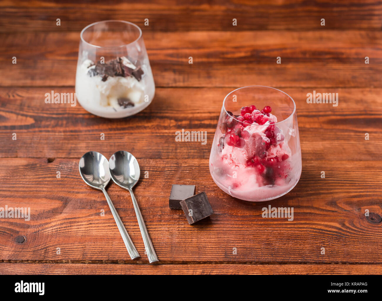 Two portions of vanilla and strawberry ice cream in glass Stock Photo ...