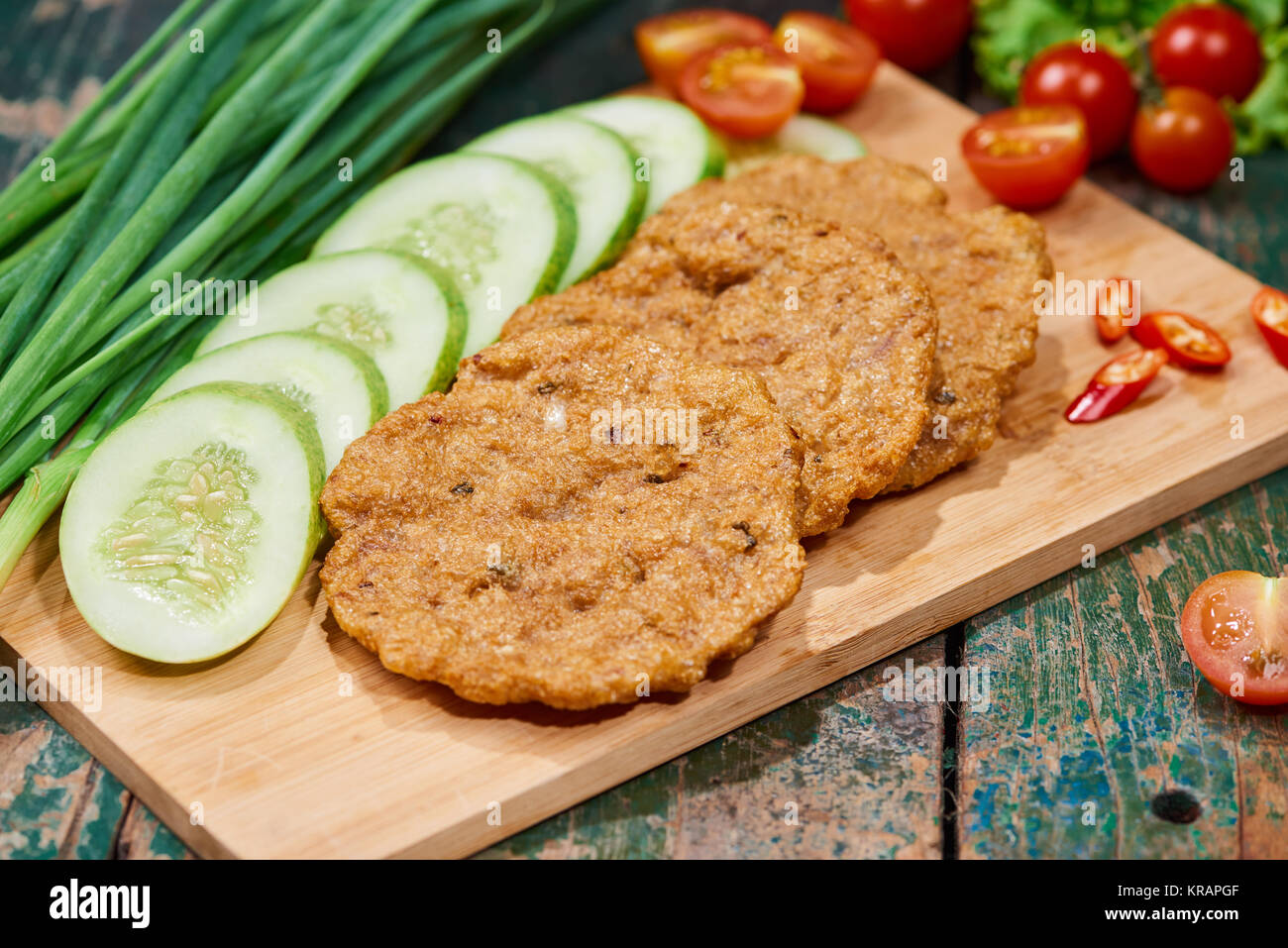 Vietnam fried fish patty with vegetable and sauce Stock Photo - Alamy