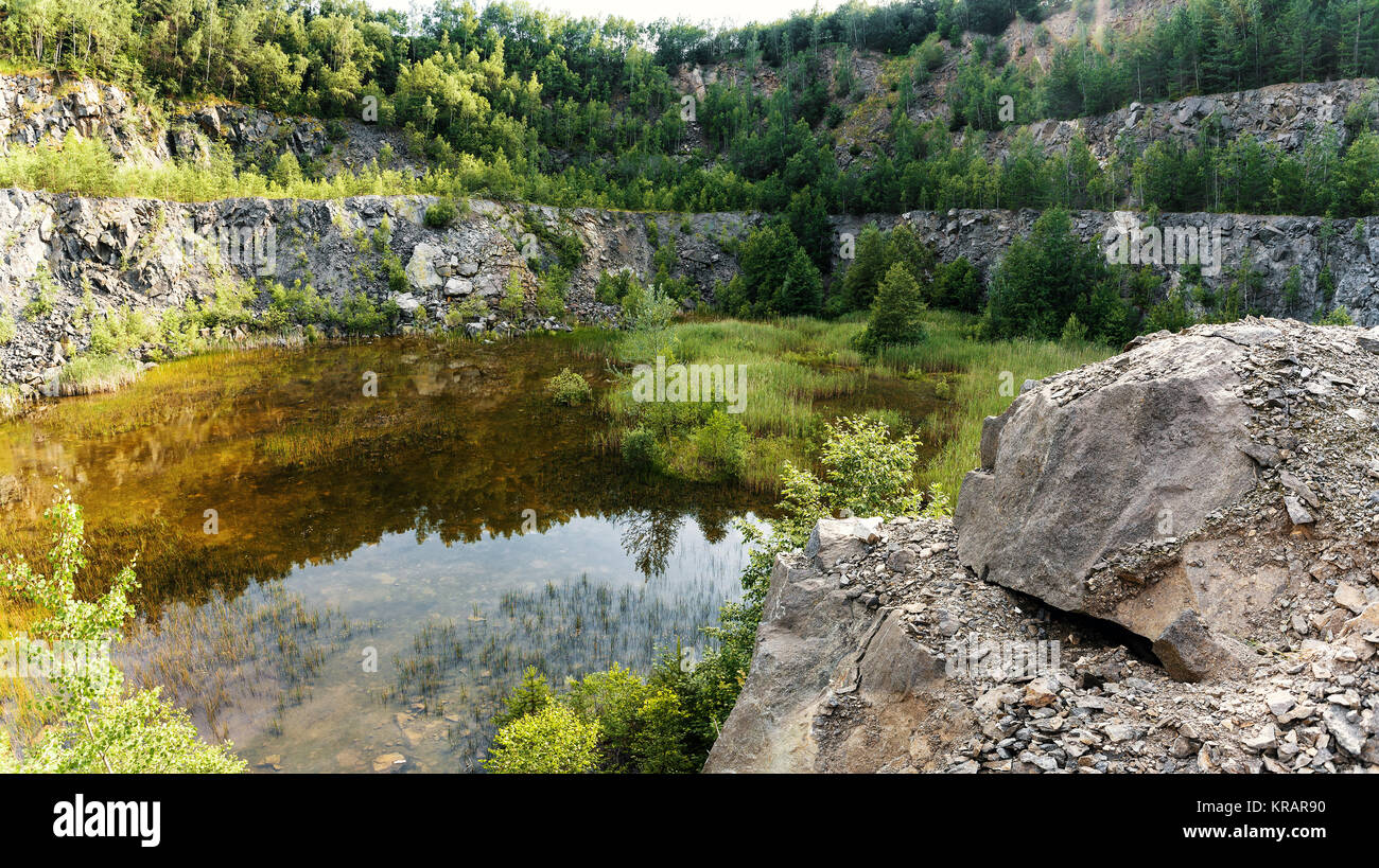 abandoned flooded quarry, Czech republic Stock Photo - Alamy