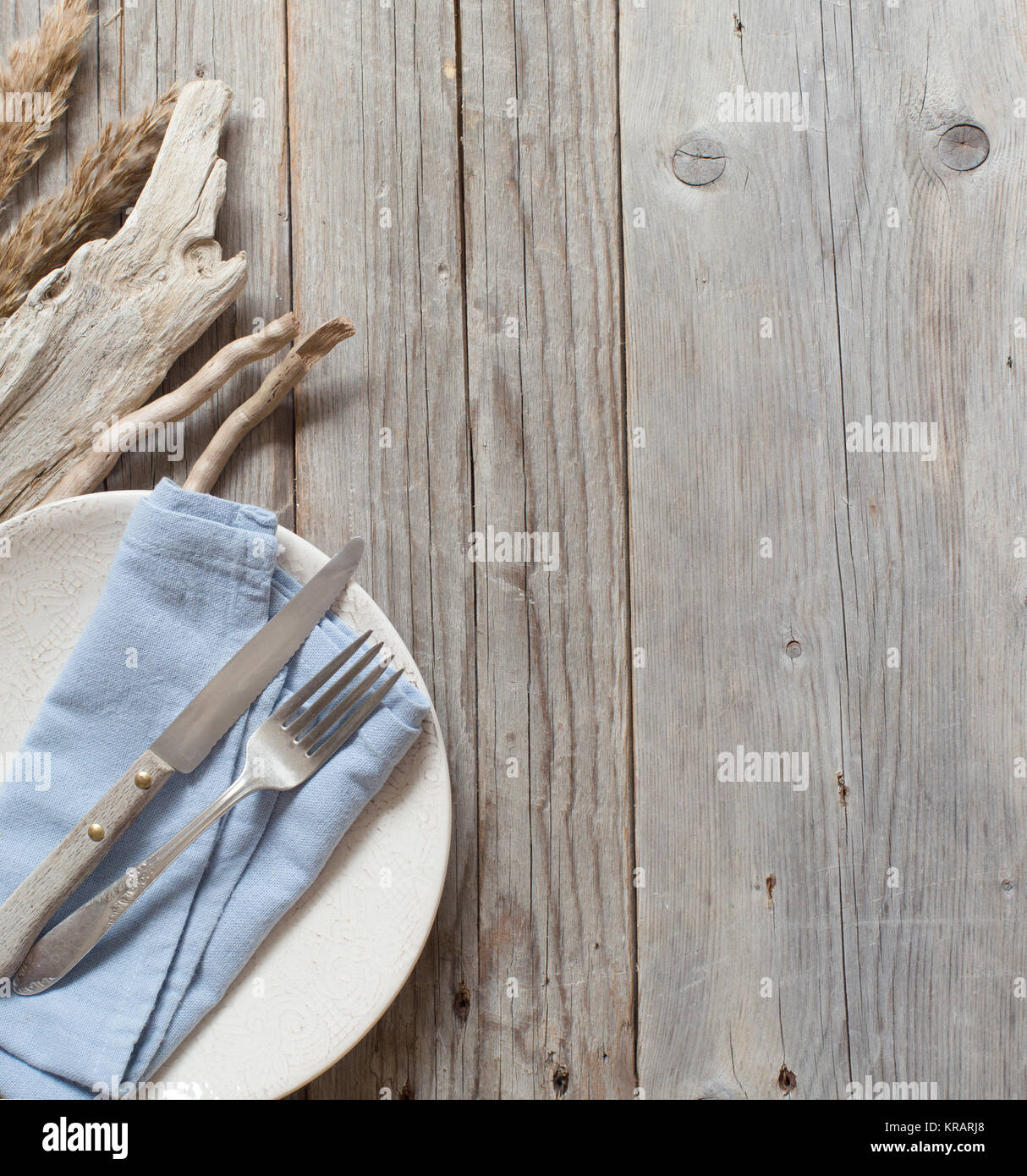 Wooden inspired table setting Stock Photo - Alamy