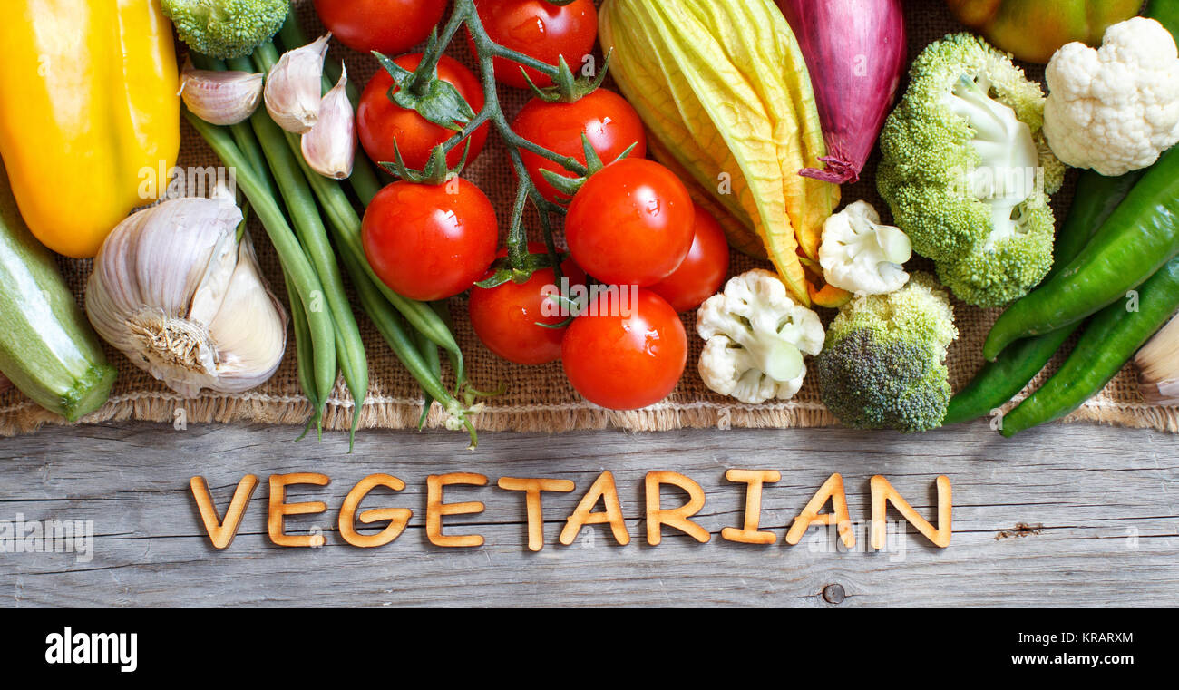 Fresh vegetables and wooden letters Stock Photo - Alamy