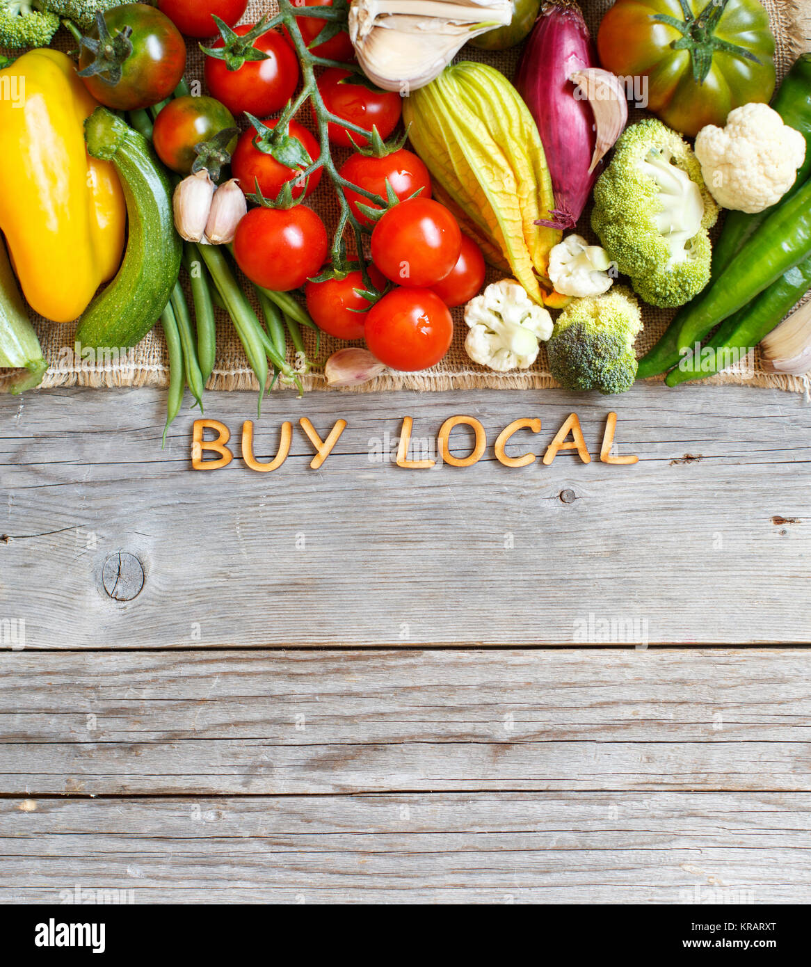 Fresh vegetables and wooden letters Stock Photo - Alamy