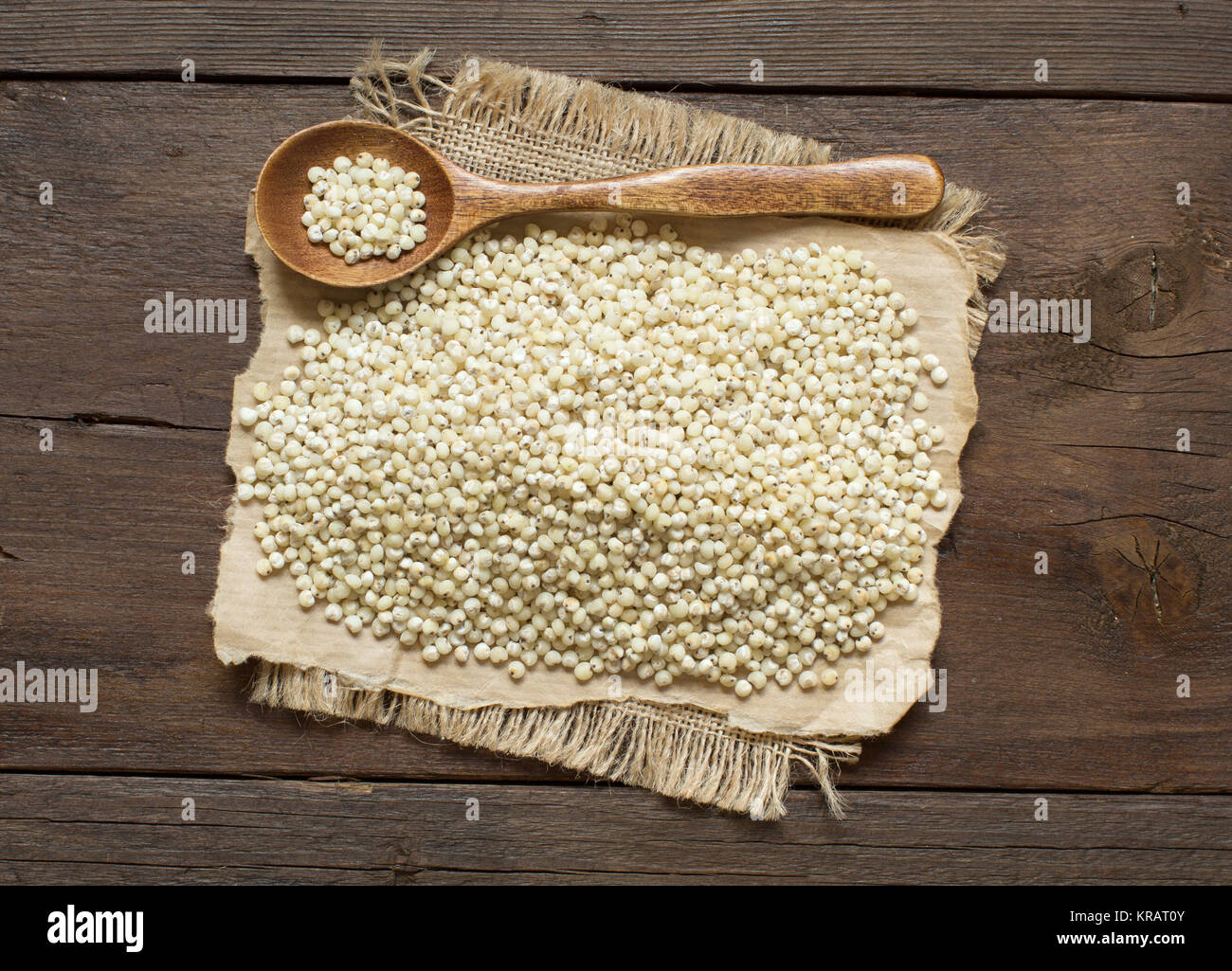 White Sorghum grain with a spoon Stock Photo - Alamy